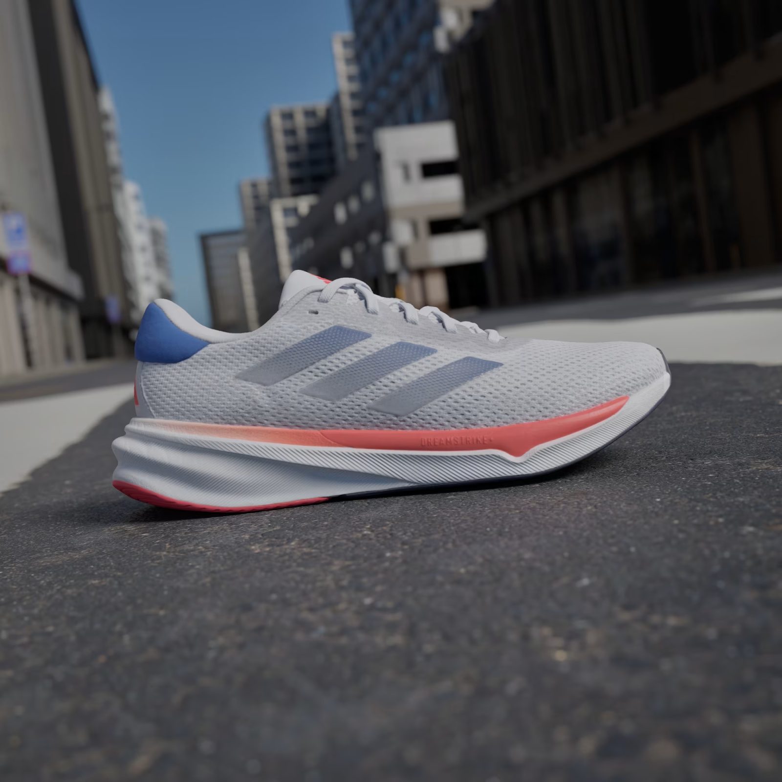 Adidas รองเท้าวิ่งผู้ชาย Supernova Stride | Cloud White/Royal Blue ...